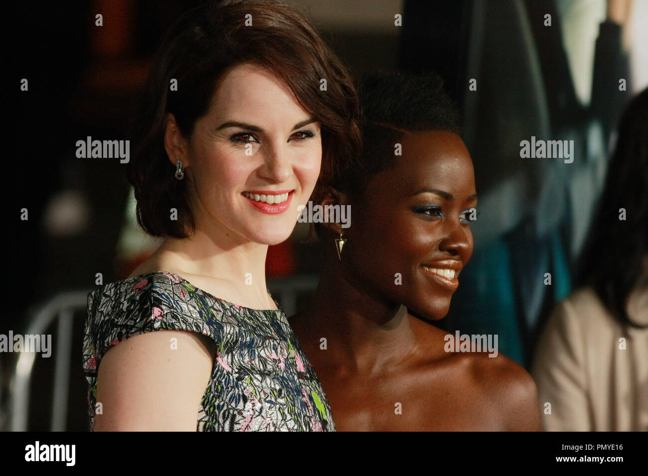 Michelle Dockery and Lupita Nyong'o at the Universal Pictures and ...