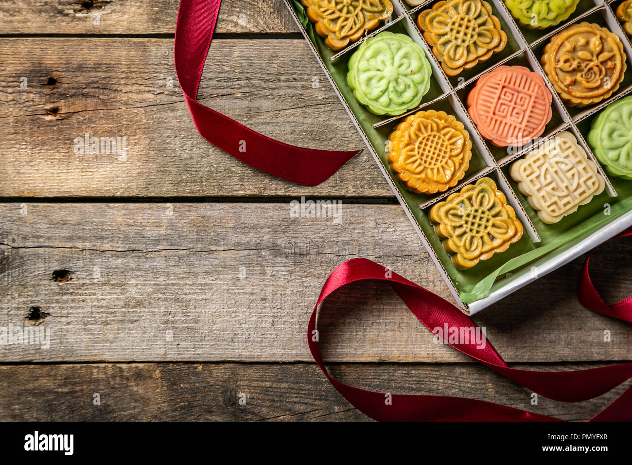 Mid Autumn Festival concept - yuebing monncakes on wood background ...