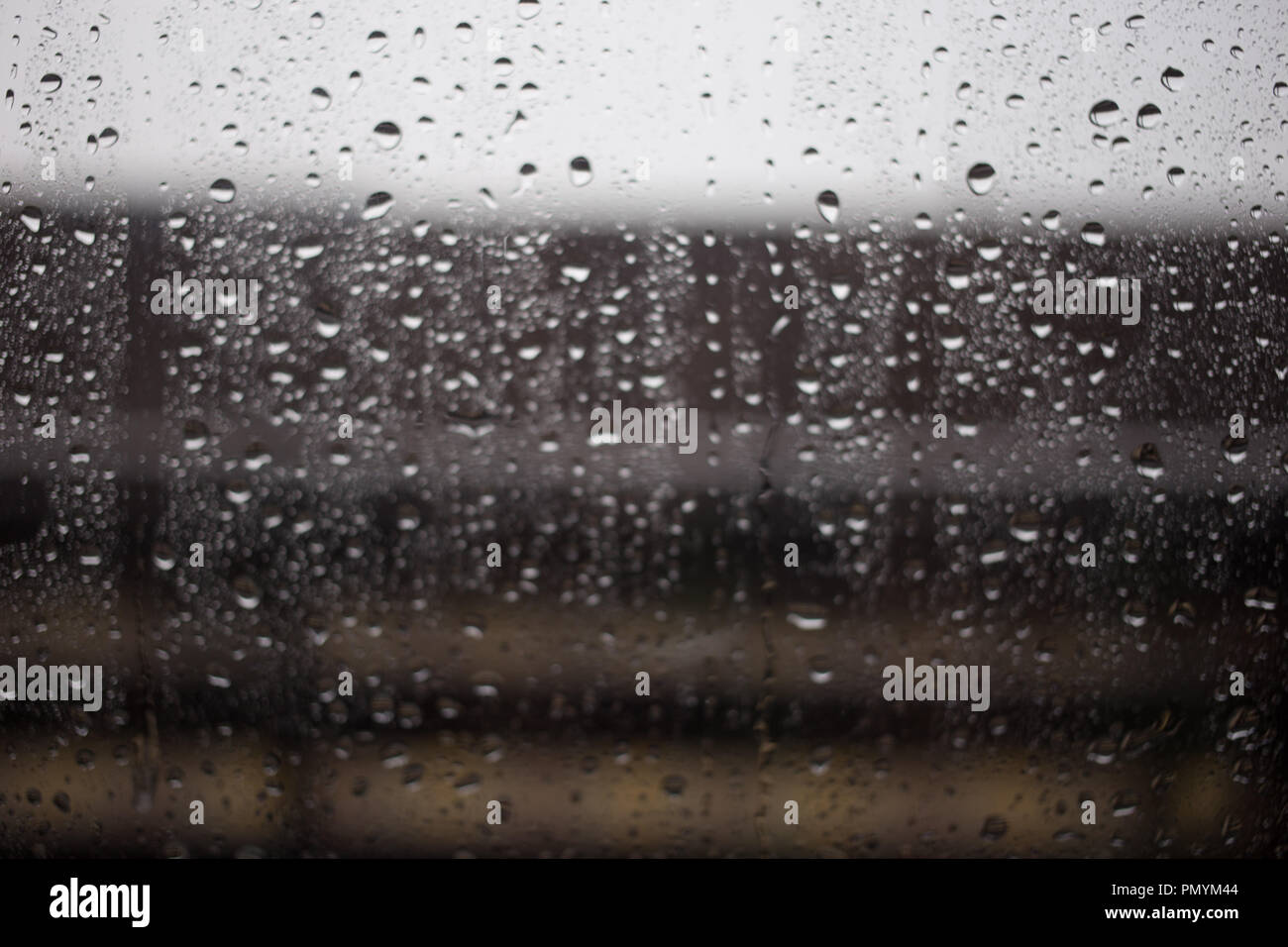 Window view blurry with heavy rain, natural raindrops on glass Stock ...