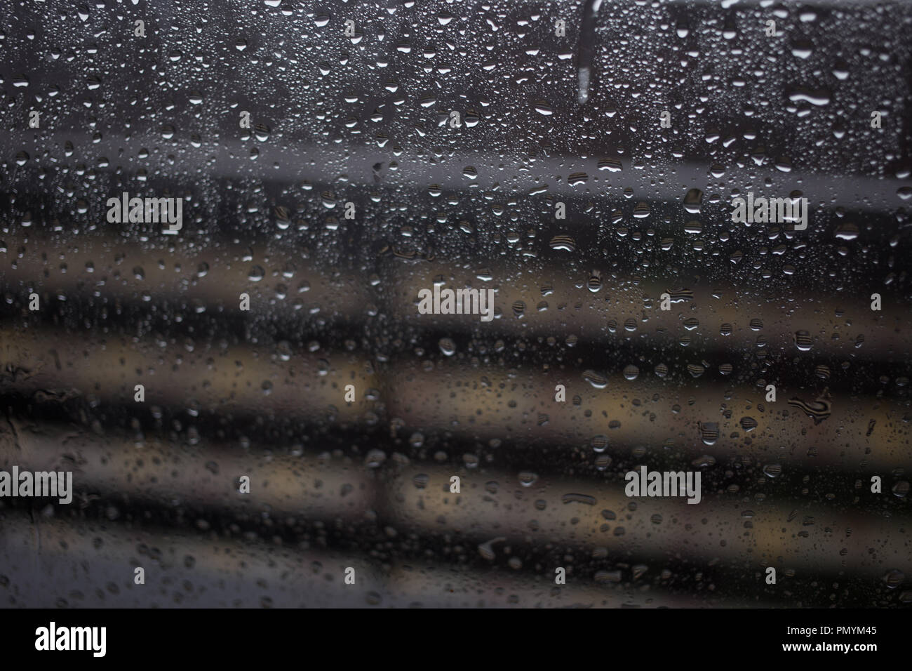 Window view blurry with heavy rain, natural raindrops on glass Stock ...