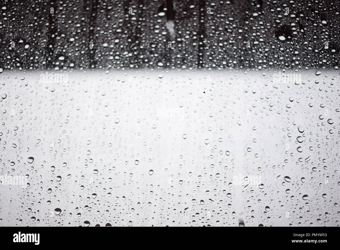 Window view blurry with heavy rain, natural raindrops on glass Stock ...