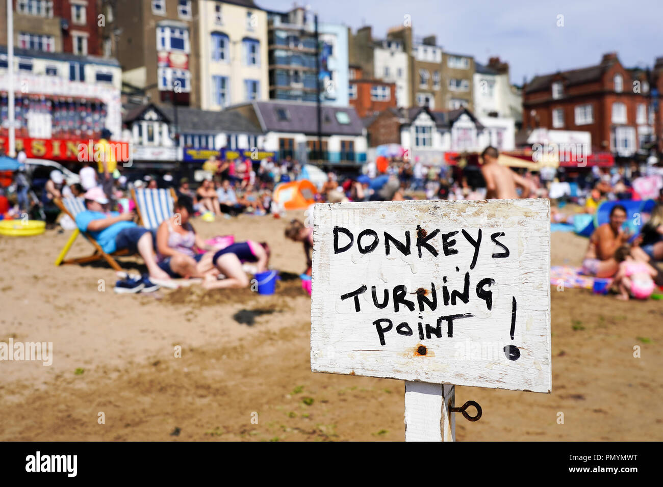 Views of ta sign for the donkey turning point on the beach in ...