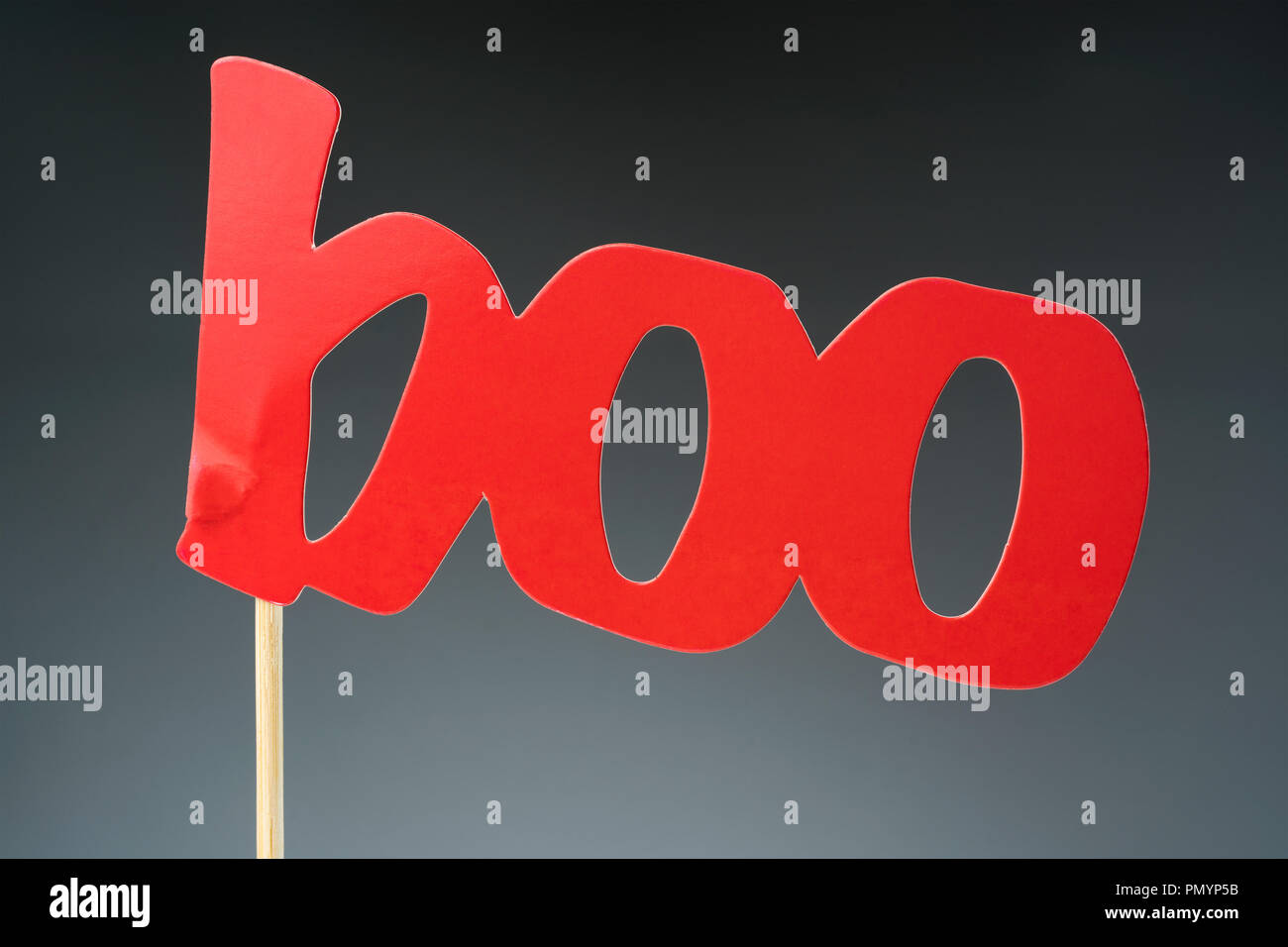 Red boo short fun saying as photo booth prop for Halloween on dark ...