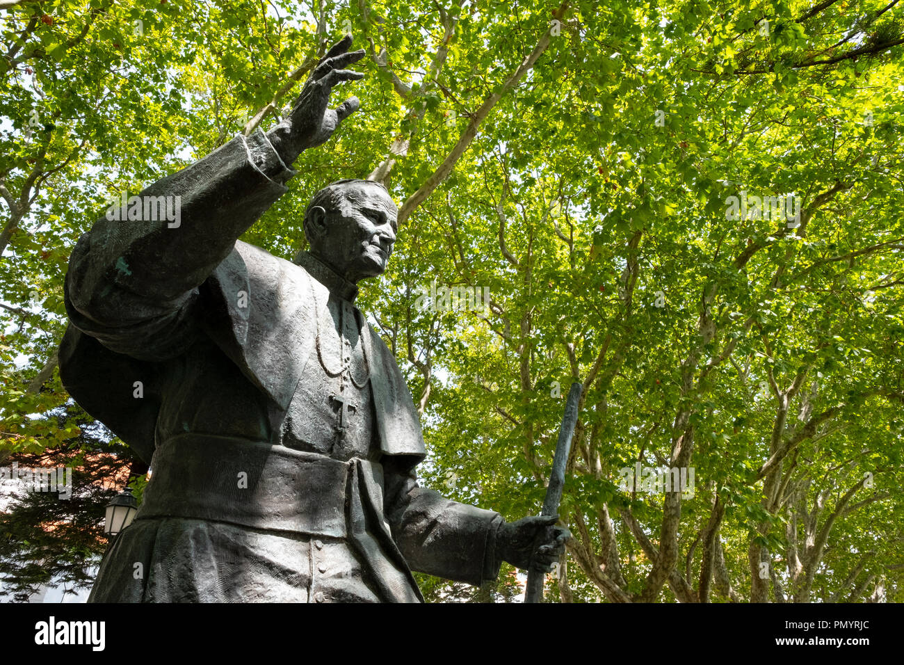 Pope John Paul II Statue in amongst the trees in Cascais Stock Photo ...