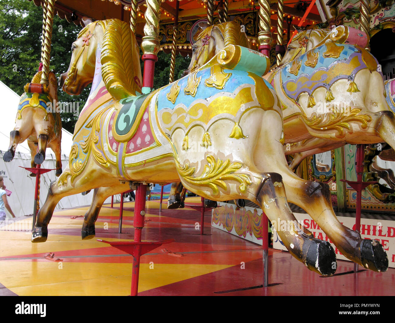 Fairground ride old fashioned merry go round ride hi-res stock ...