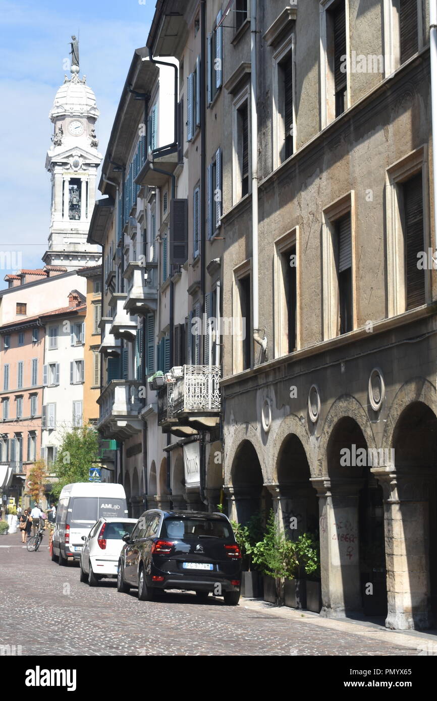 Italy, the lovely city of Bergamo. An elegant arcaded street in the ...