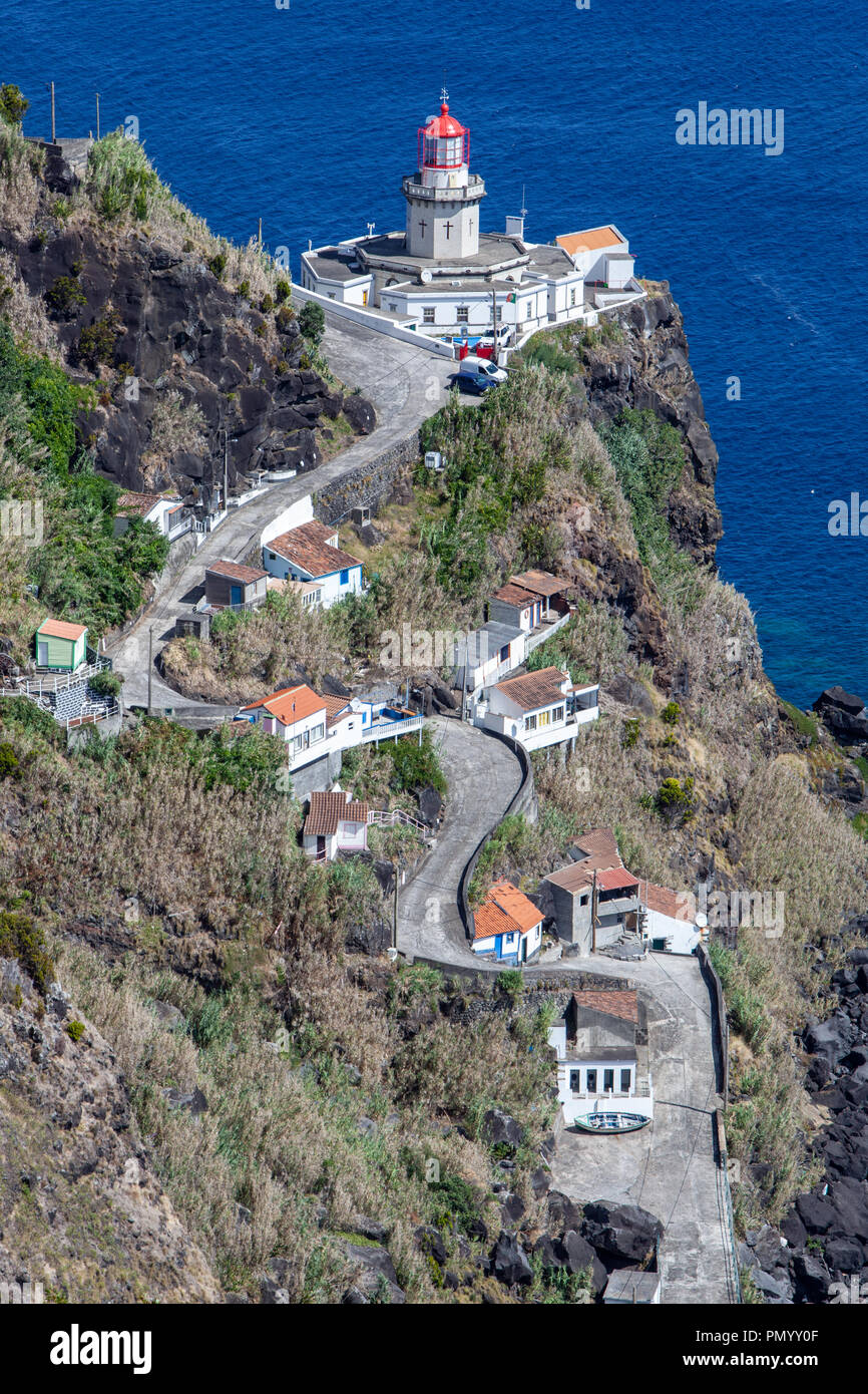 view of arnel lighthouse sao miguel azores on the cliffside Stock Photo ...