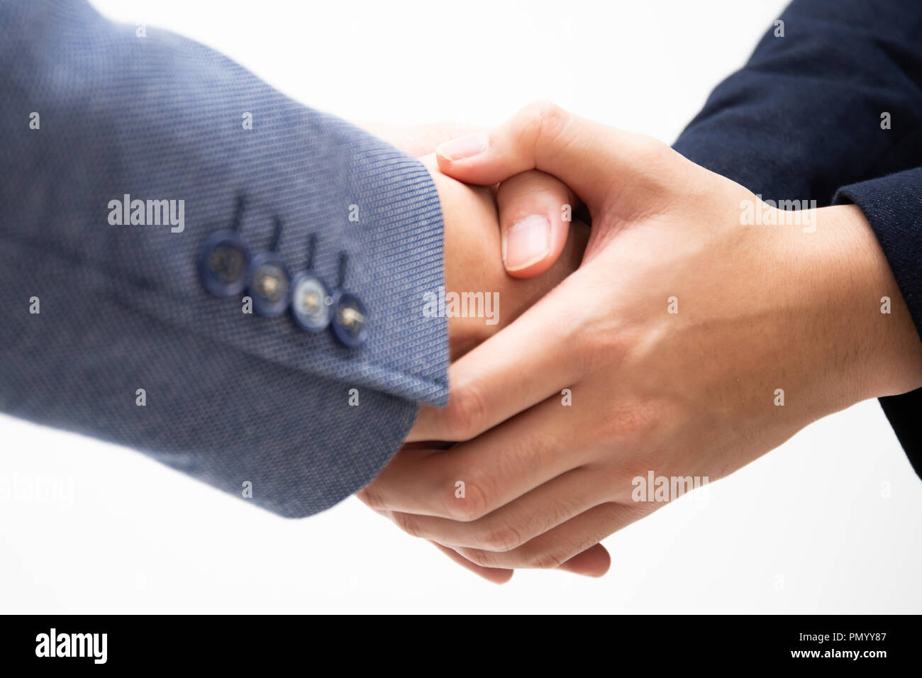 Successful business men shake hands isolated on white background Stock ...