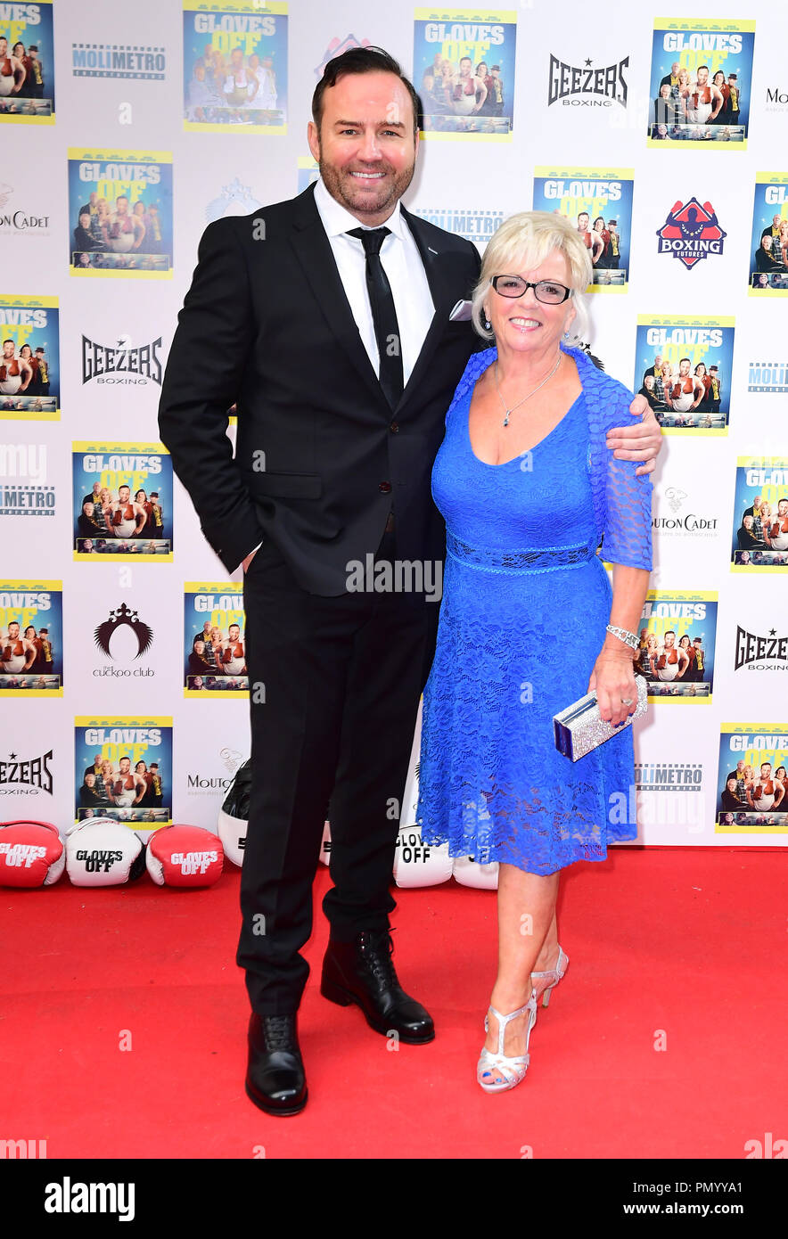 Brad Moore (left) and his mother Brenda Moore attending the premiere of ...