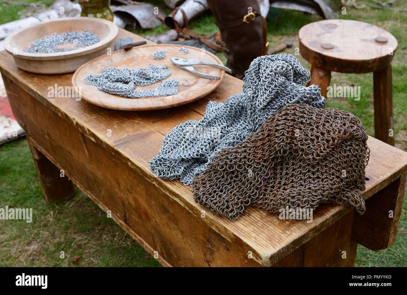 Chain mail display at a Medieval Fair. A pile of armour lies on a ...