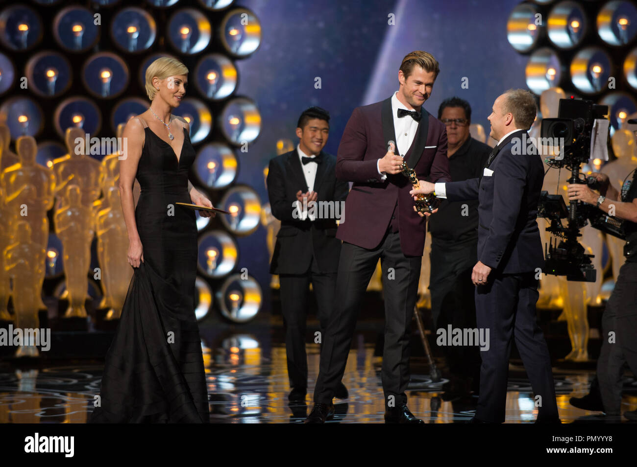 Chris Hemsworth and Charlize Theron present the Oscar® for Achievement ...