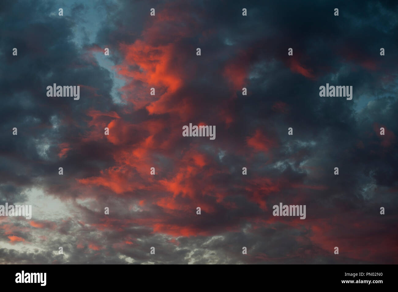Altocumulus perlucidus clouds dramatic sunset Stock Photo - Alamy