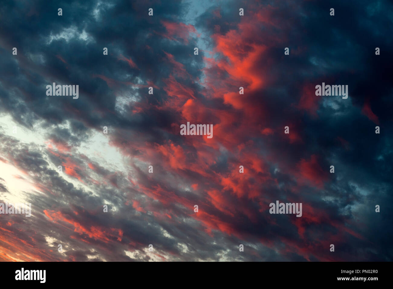Altocumulus perlucidus clouds dramatic sunset Stock Photo - Alamy