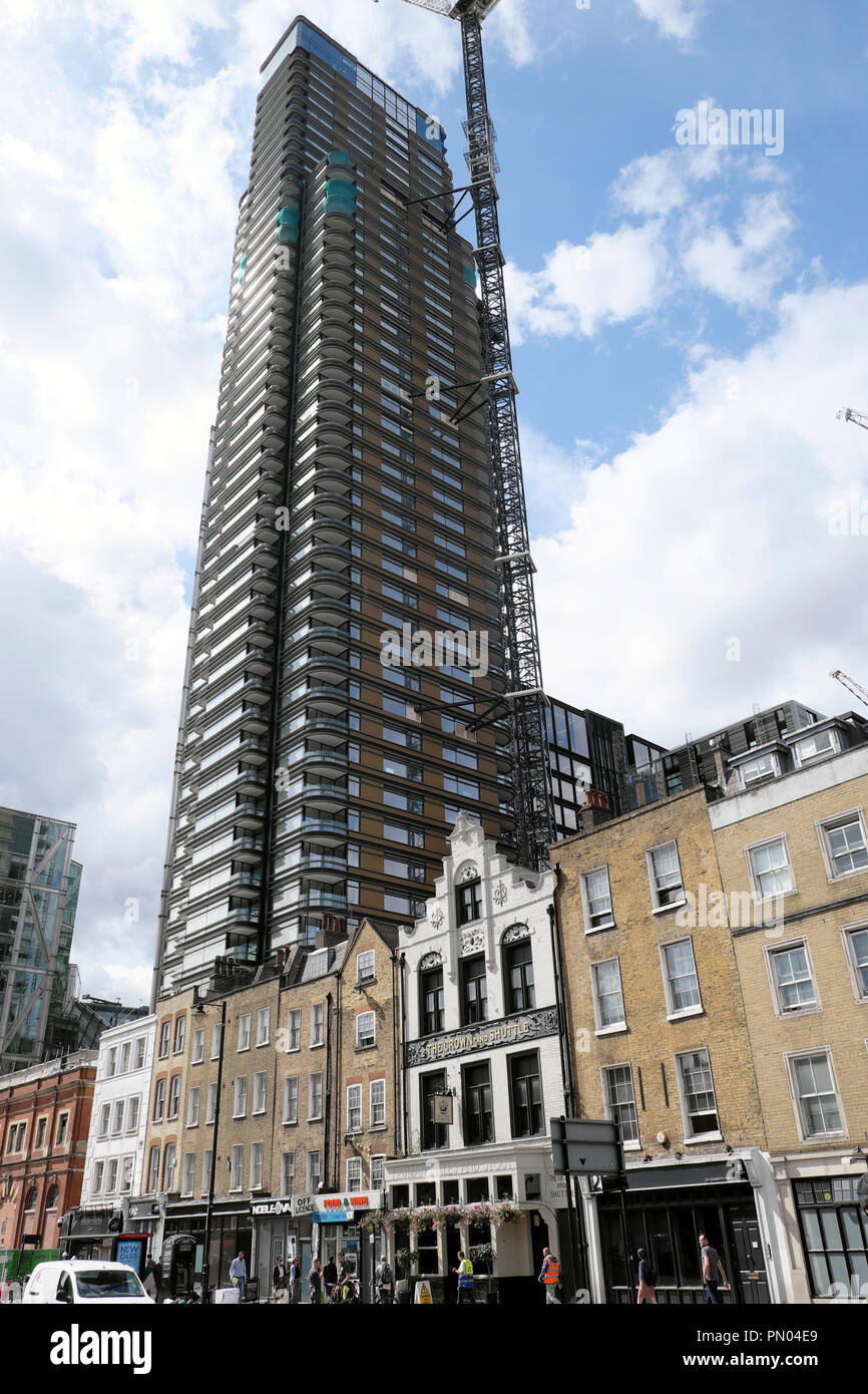 Street view of Norton Folgate and high rise modern apartment block in ...