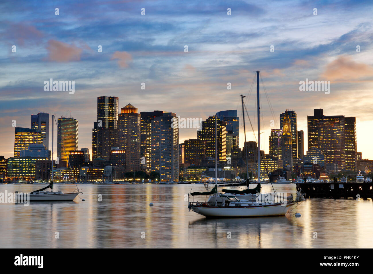 Boston Harbor city skyline sunset Stock Photo - Alamy