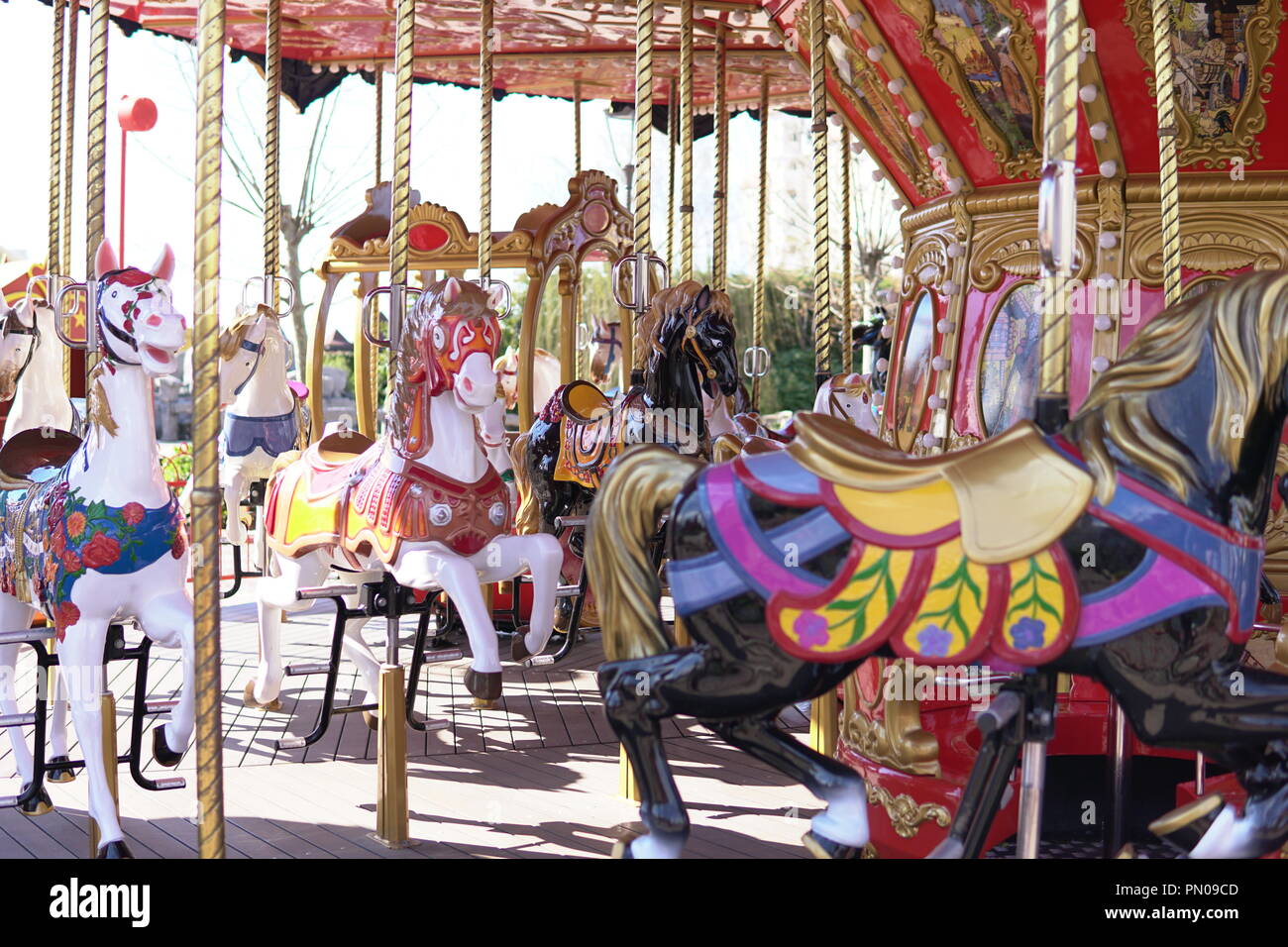 Kid attractions colorful carousel horse fun x Stock Photo - Alamy