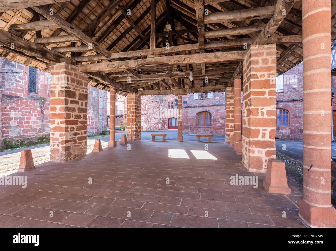 France, Correze, Meyssac, the 18th century old corn exchange in red ...