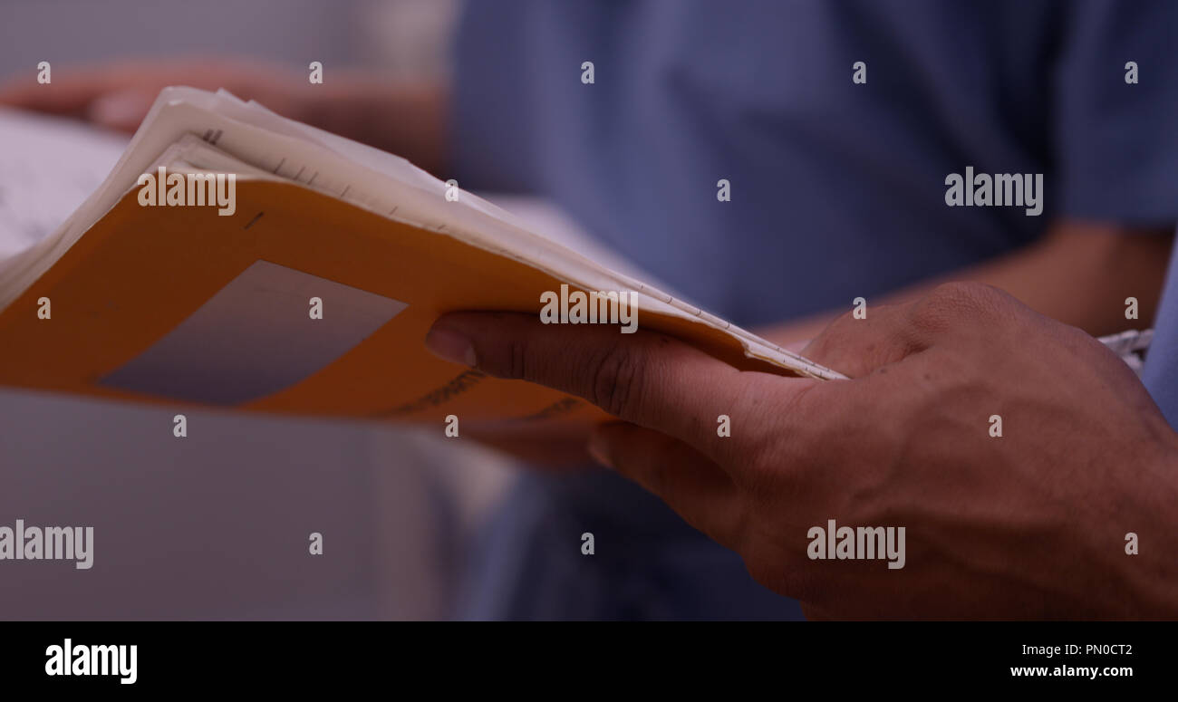 Flipping through pages hi-res stock photography and images - Alamy