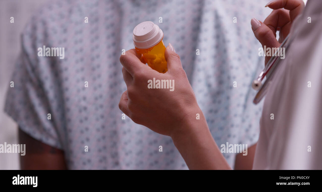 Doctor explaining drugs hi-res stock photography and images - Alamy