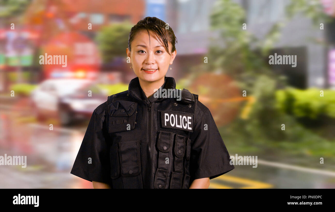 Asian police woman hi-res stock photography and images - Alamy