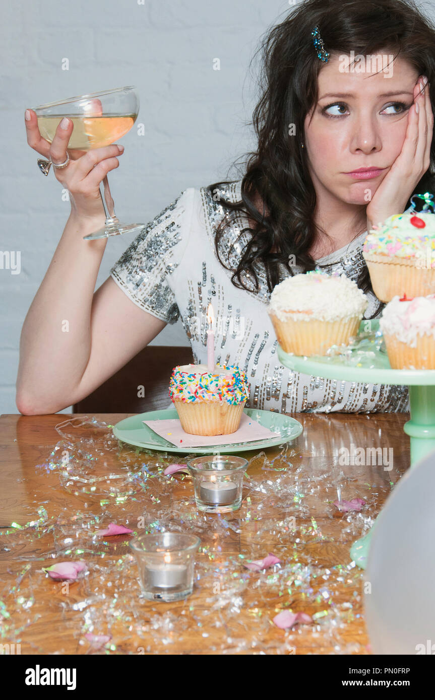 A sad party girl Stock Photo - Alamy