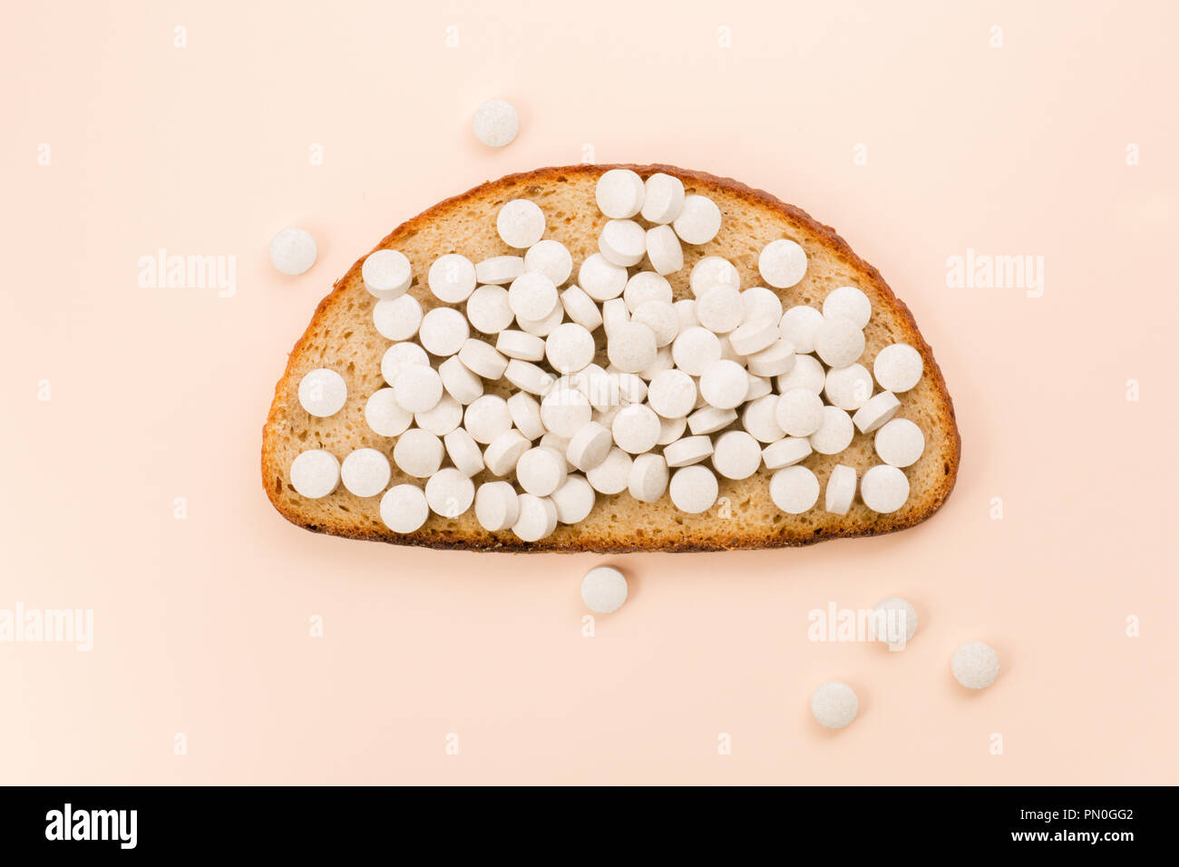 The Pills on a piece of bread Stock Photo - Alamy