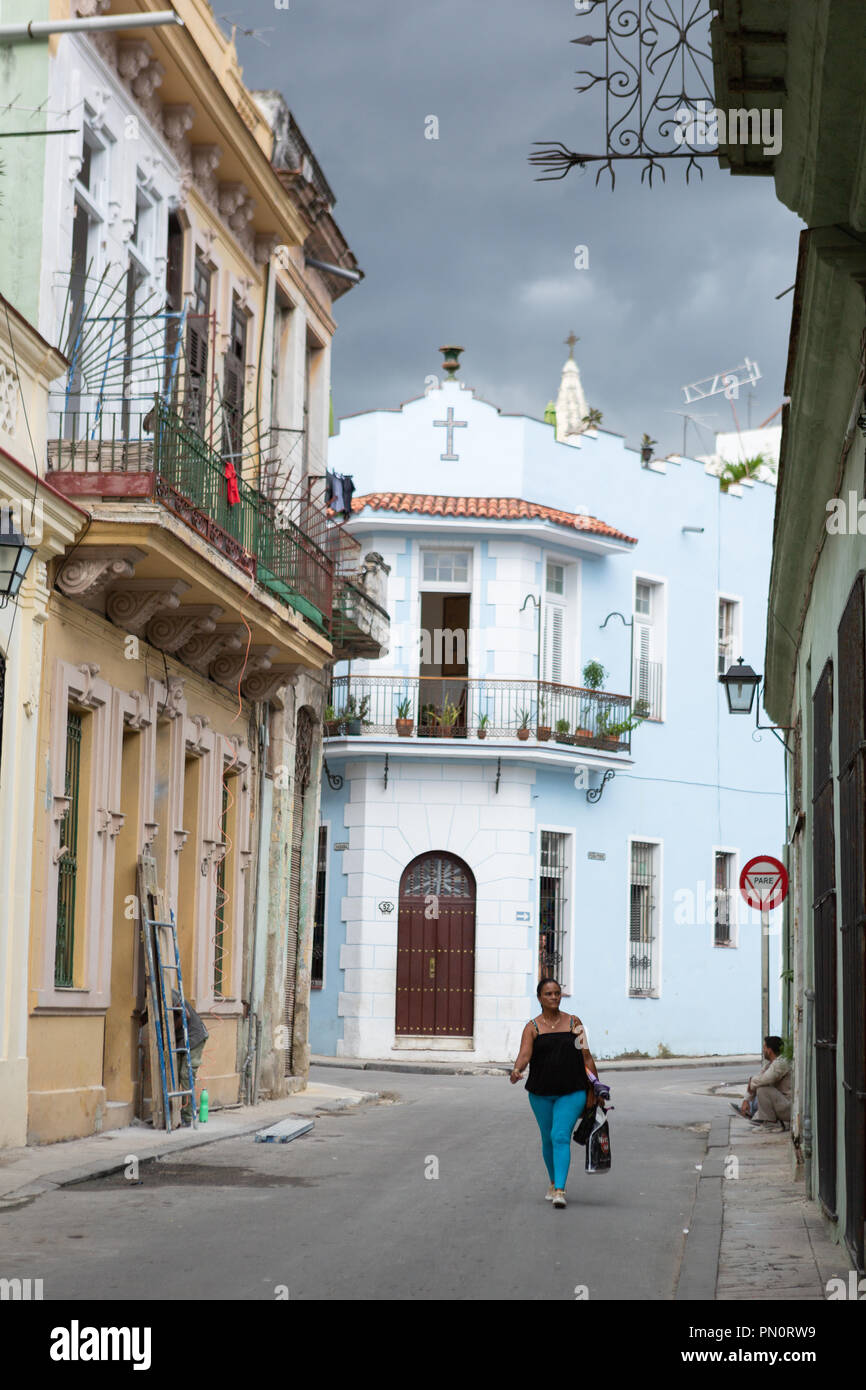 Cuban woman walking, street scene, Havana, Cuba Stock Photo - Alamy