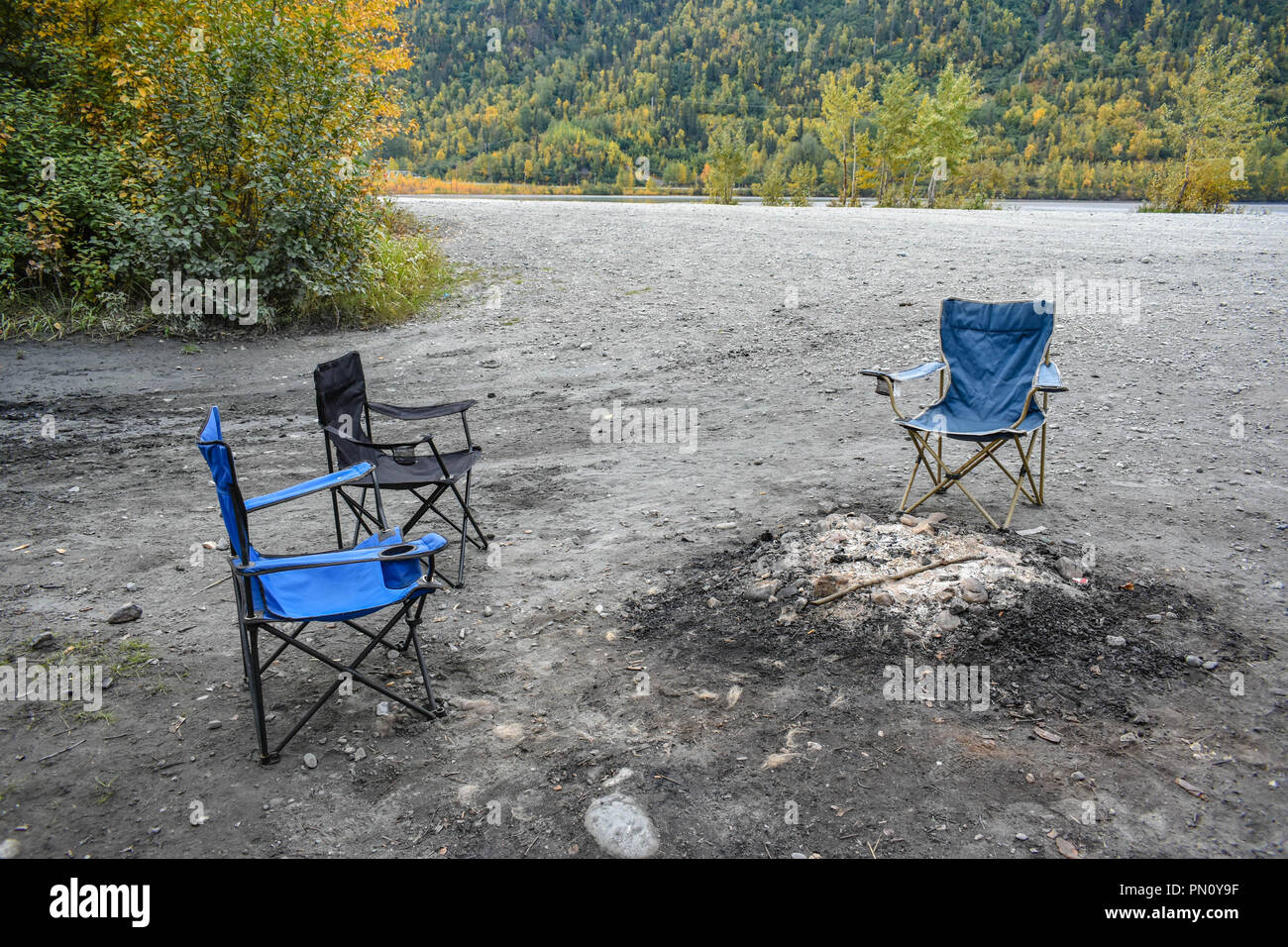 The end of the camping season in Alaska. We sit around a campfire at ...