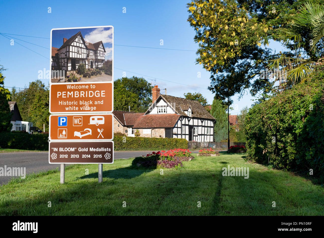 Pembridge village sign in front of a Black and White English Timber ...