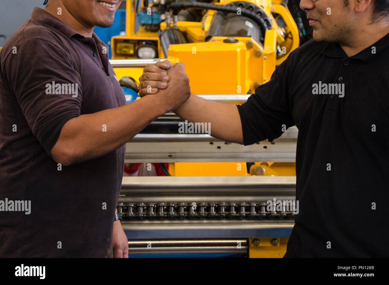 Handshake of construction worker at the construction site. Concept of ...