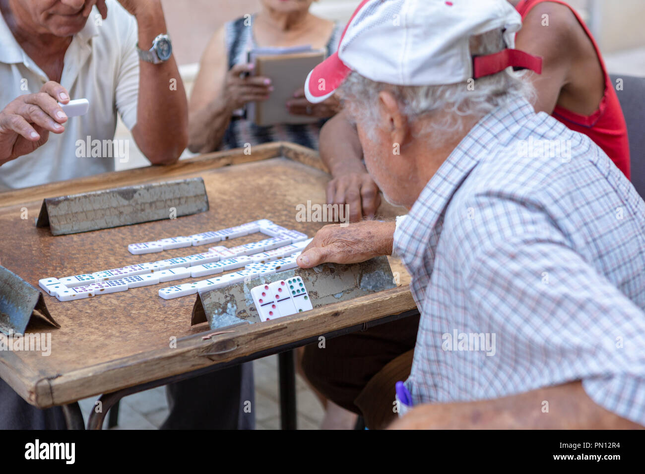 Outdoor domino game played by Cuban men, Havana, Cuba Stock Photo - Alamy