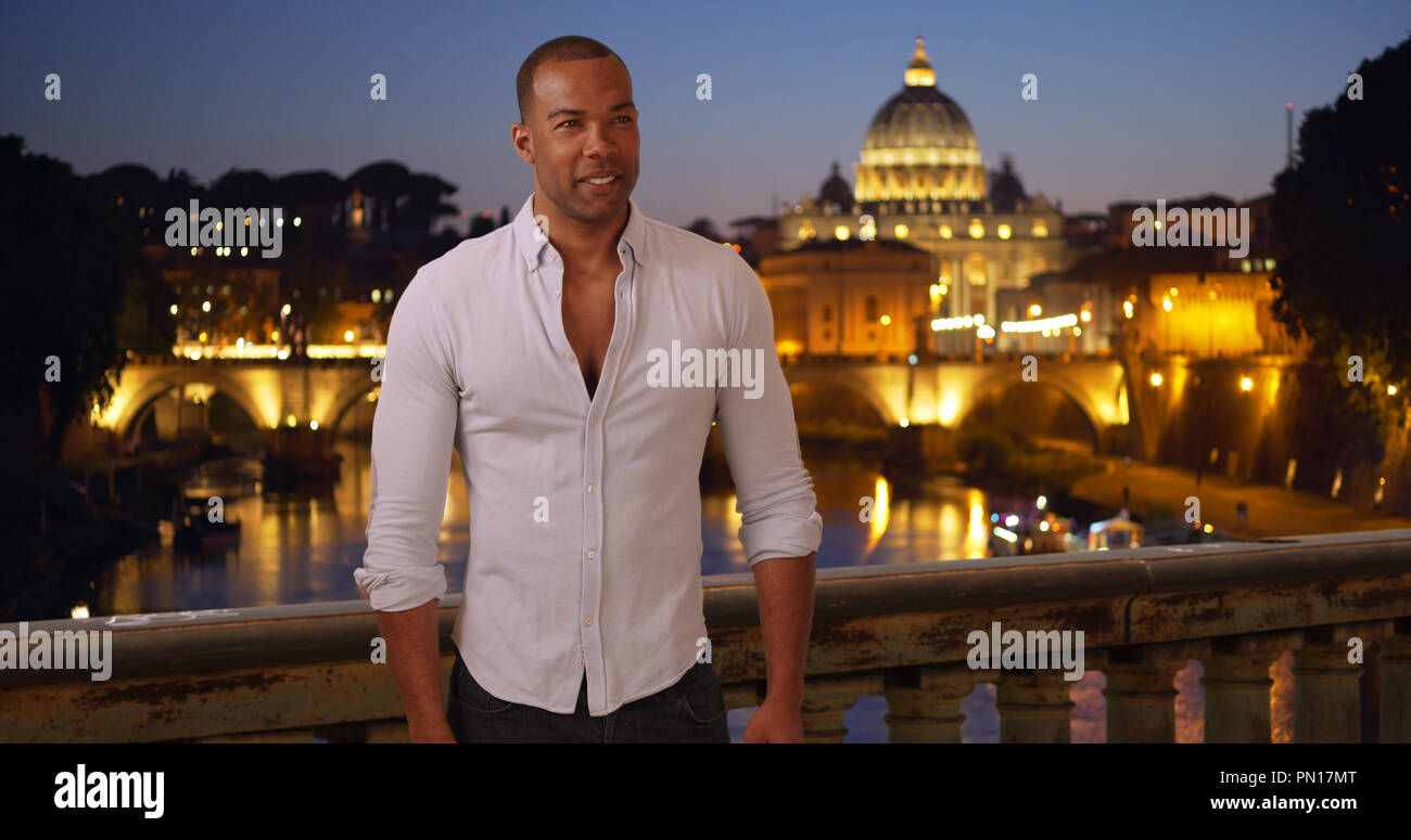 Handsome black man traveling in Italy enjoys himself while sightseeing ...