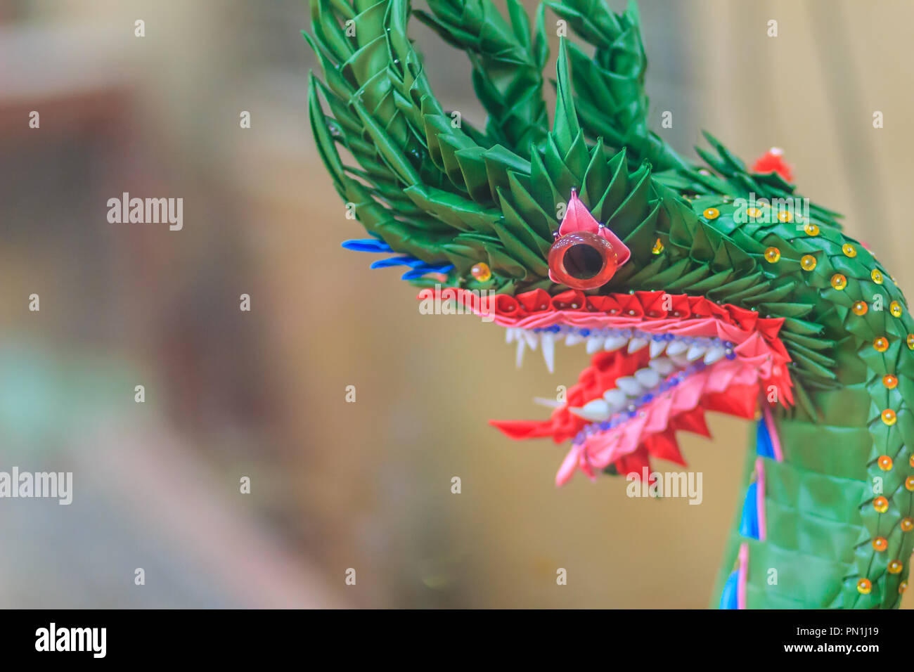 Beautiful Naga made from fabric. Naga shaped Bai Sri, or traditional ...