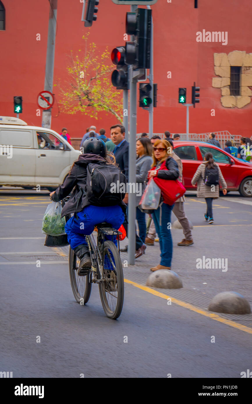 SANTIAGO, CHILE - SEPTEMBER 13, 2018: Unidentified man riding his blue ...