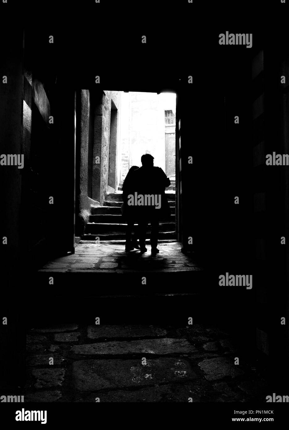 Walking Alley Silhouette Black and White Stock Photos & Images - Alamy