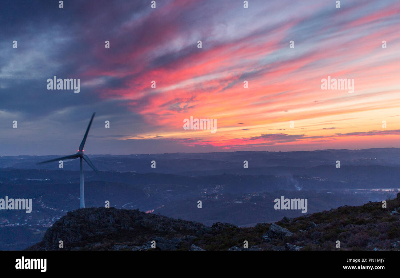 Wind turbine at sunset Stock Photo - Alamy