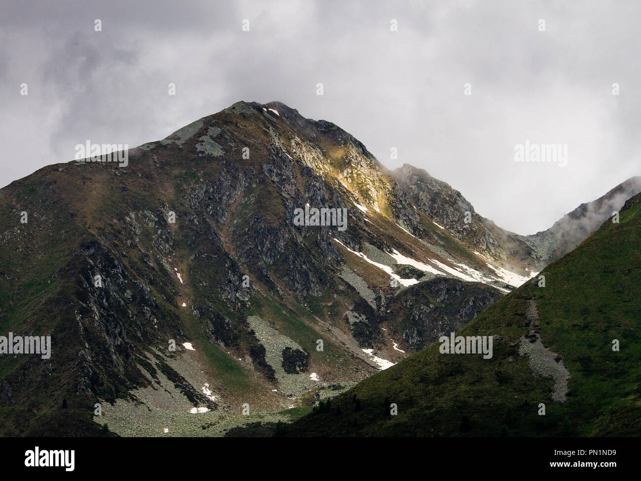 Sun lit mountain top hi-res stock photography and images - Alamy
