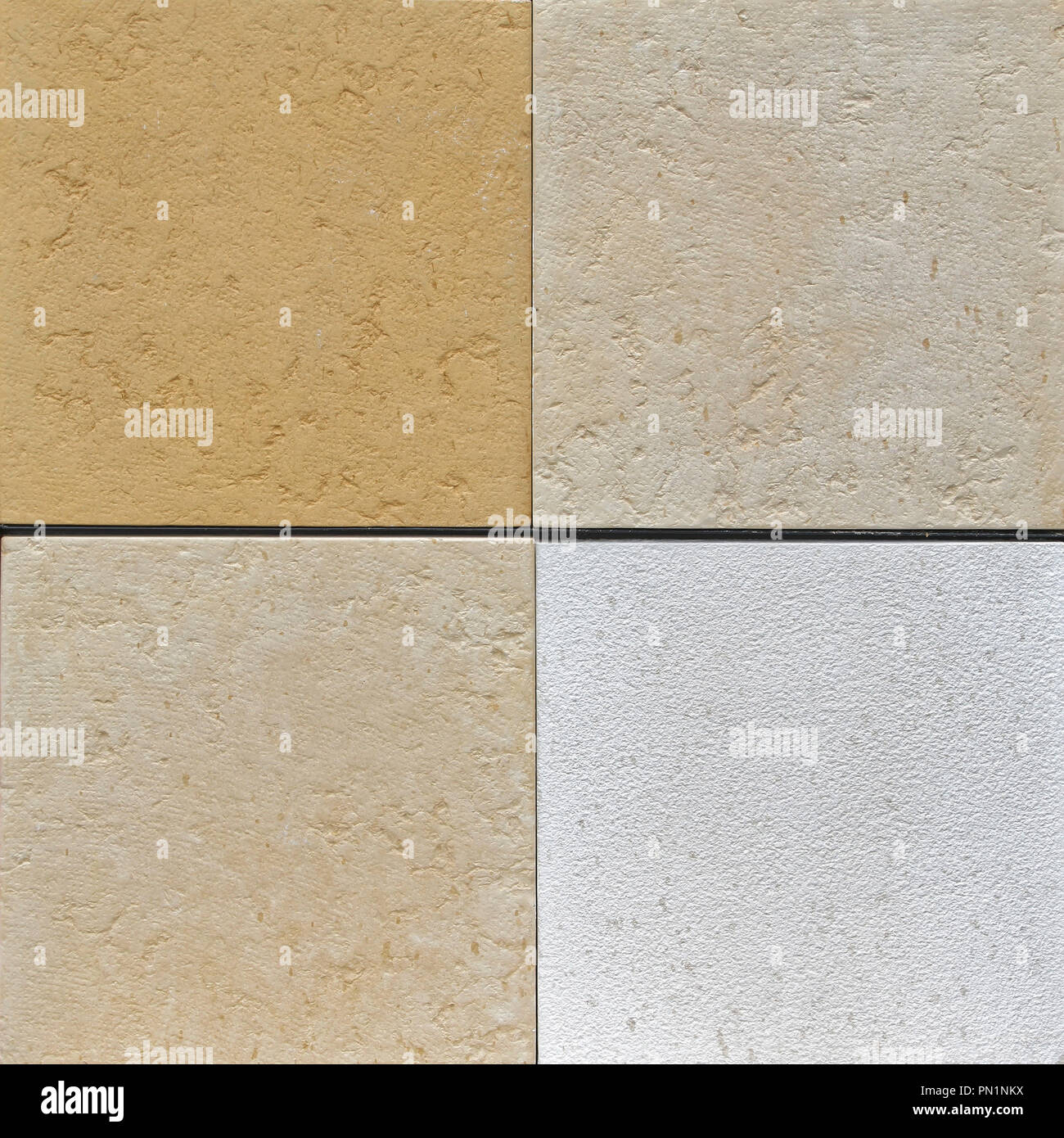 Four Tiles Made From Natural Beige Stone Material Stock Photo - Alamy