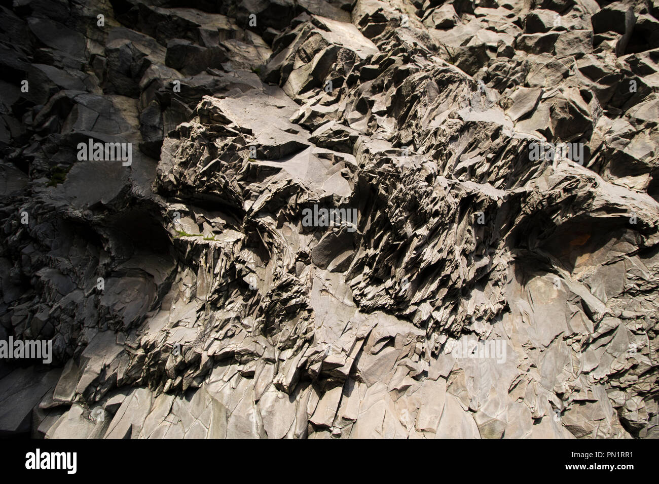 Rock texture. Close up of rough grey rock surface Stock Photo - Alamy