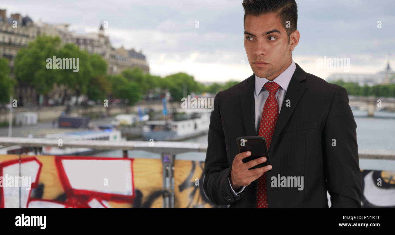 Successful man in suit checks hi-res stock photography and images - Alamy