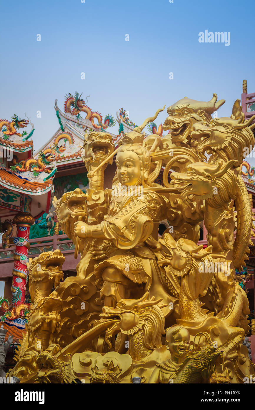Beautiful golden Nezha statue at Wihan Thep Sathit Phra Kitti Chaloem ...