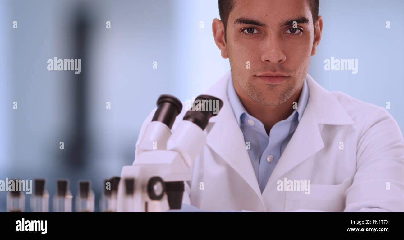 Portrait of handsome millennial male scientist inside laboratory Stock ...