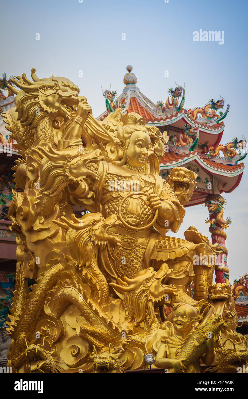 Beautiful golden Nezha statue at Wihan Thep Sathit Phra Kitti Chaloem ...