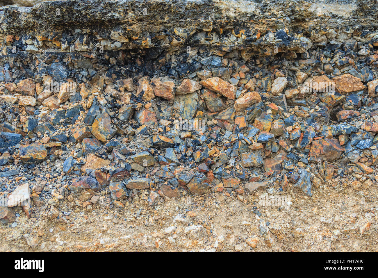 The layer of asphalt road with soil and rock after landslide Stock ...