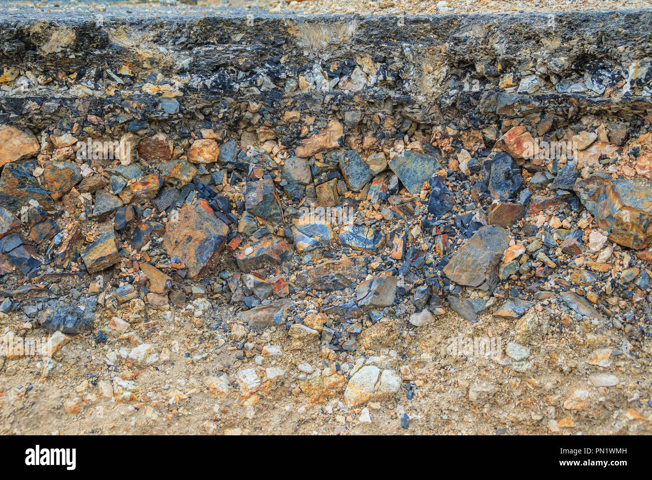 The layer of asphalt road with soil and rock after landslide Stock ...