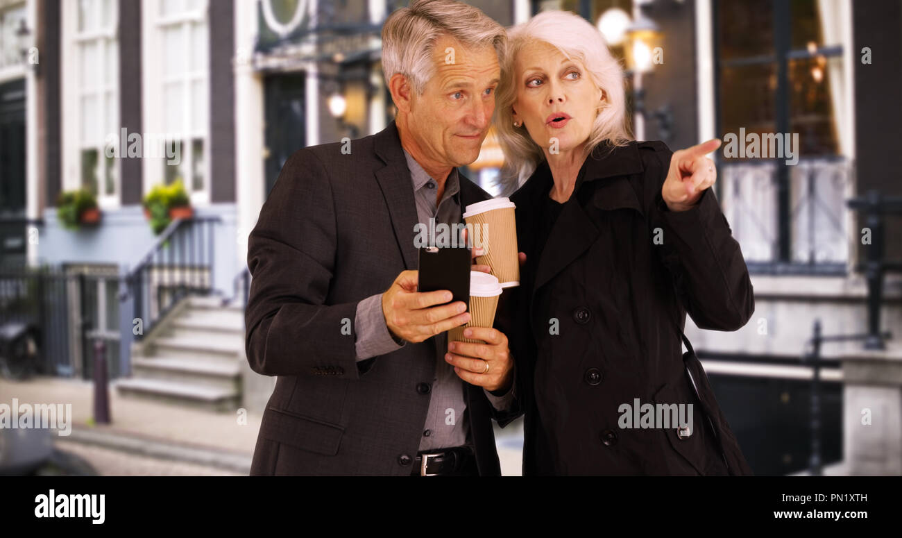 Smart seniors using smartphone to find their way home Stock Photo - Alamy