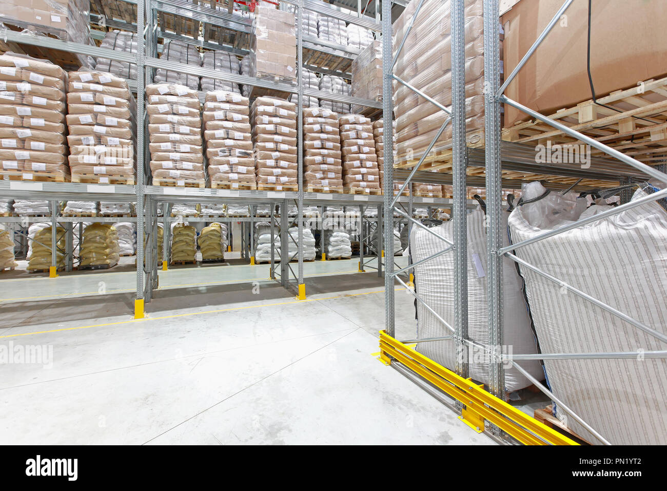 Distribution center warehouse interior with sacks and bags Stock Photo ...