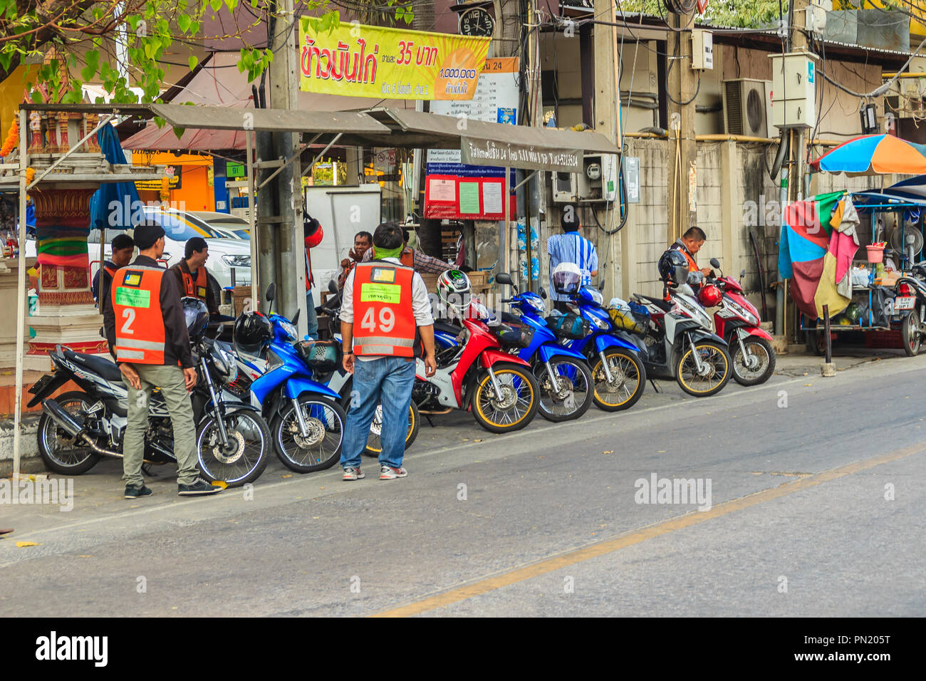 Bangkok, Thailand - March 8, 2017: Motorbike taxi waiting for the ...