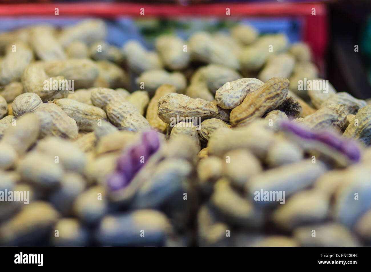 Purple peanut for sale at the fresh market. The peanut, also known as ...