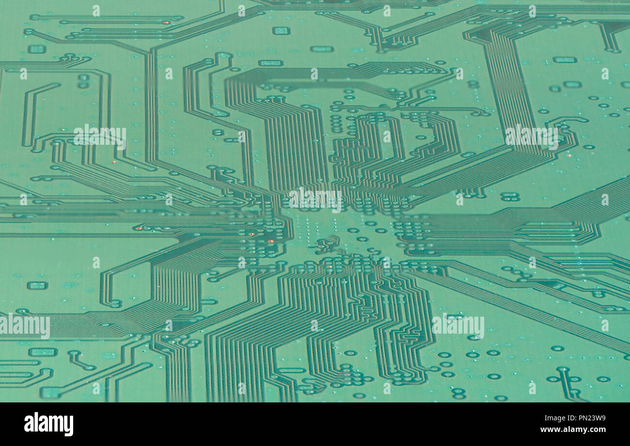 Green electronic circuit board with tracks background Stock Photo - Alamy
